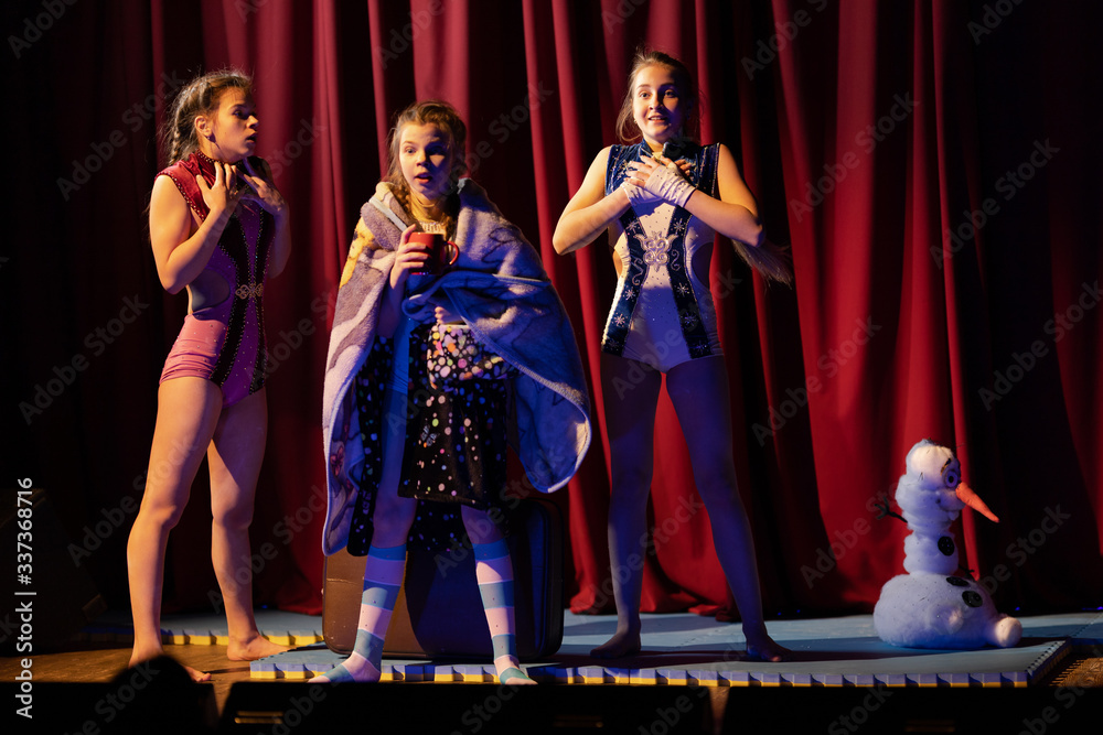 Girls show the performance on stage in the theater. Stock Photo | Adobe ...