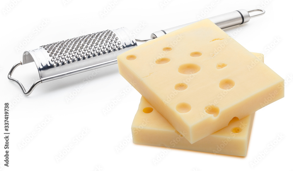 Two portions (blocks) of Emmental Swiss cheese with a grater. Texture ...