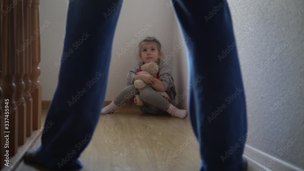 Scared child. Father and daughter. Child abuse concept. Child on the ...