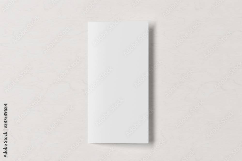 Blank square leaflet on white wooden background. Bi-fold or half-fold ...