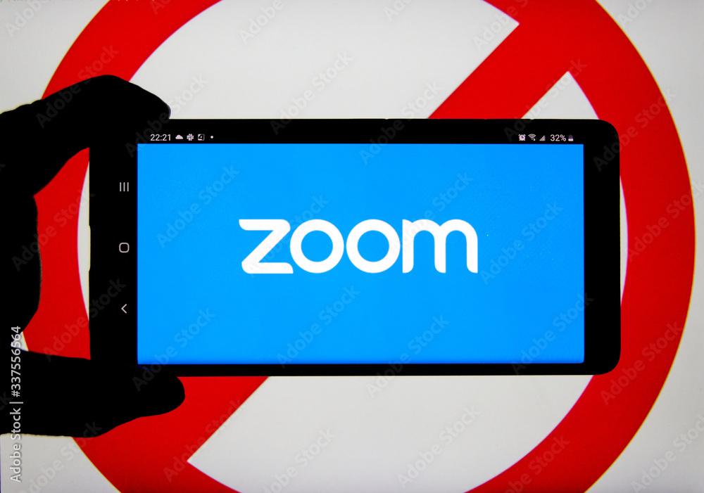 Zoom app and logo on screen over prohibited ban sign. Zoom software ...
