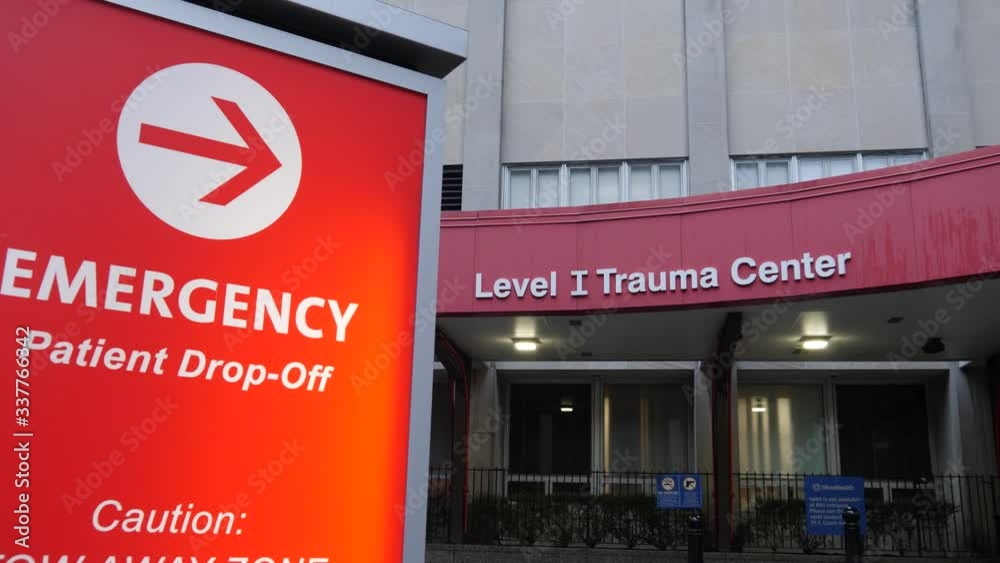 Hospital emergency entrance with level I trauma center sign Stock ビデオ ...