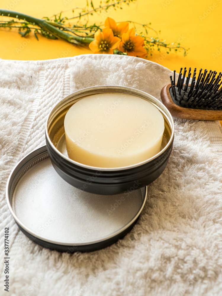 Solid, plastic free Shampoo bar in a round metal container Stock Photo ...