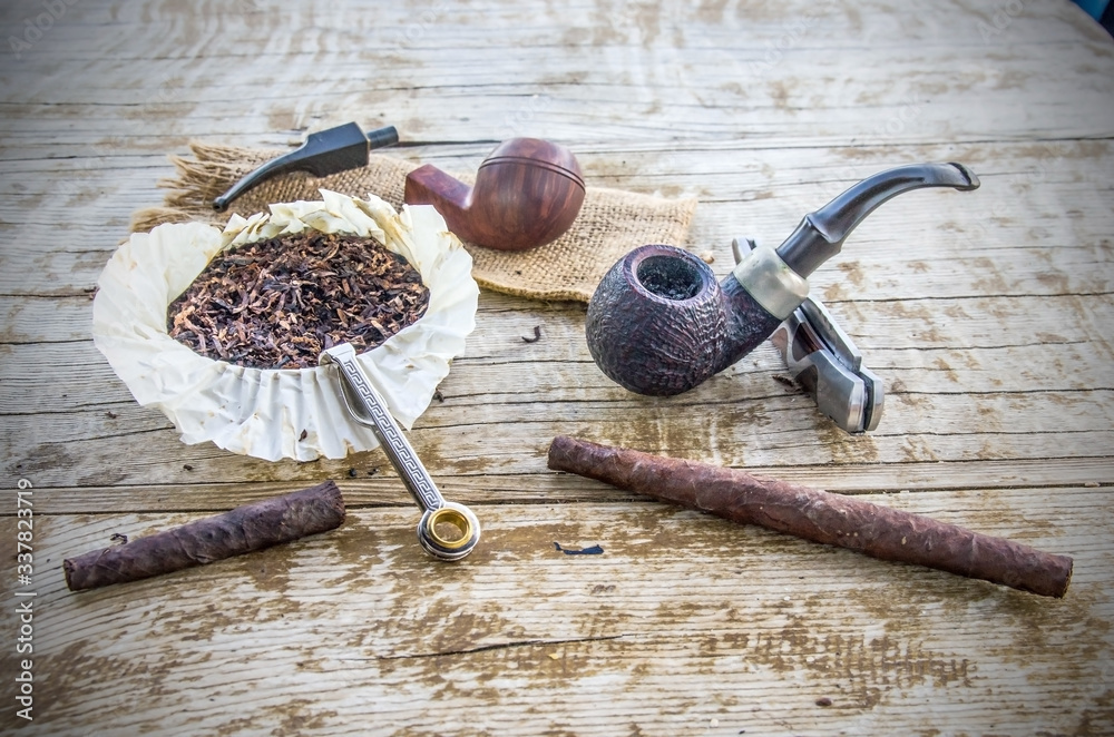 tools for the pleasure of slow smoking, pipe, cigar, tobacco. Stock ...