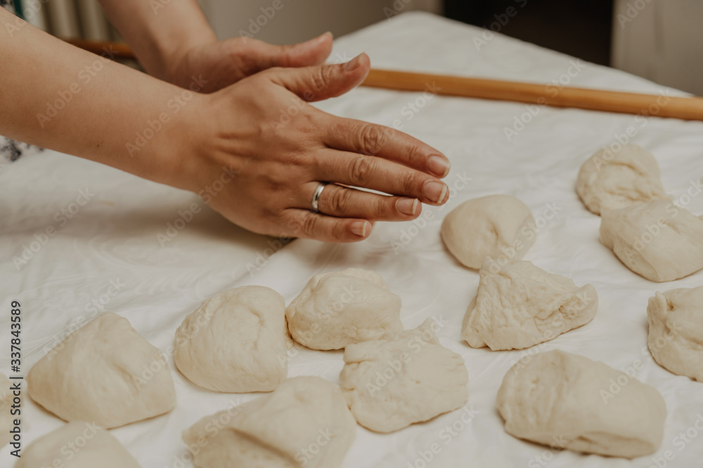 Muslim woman in isolation making bread for meal during holy month ...