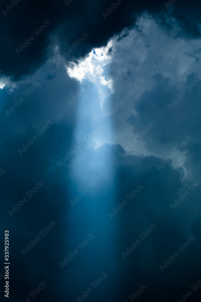 soft light Rays of light shining down ground. dark sky with sun rays ...