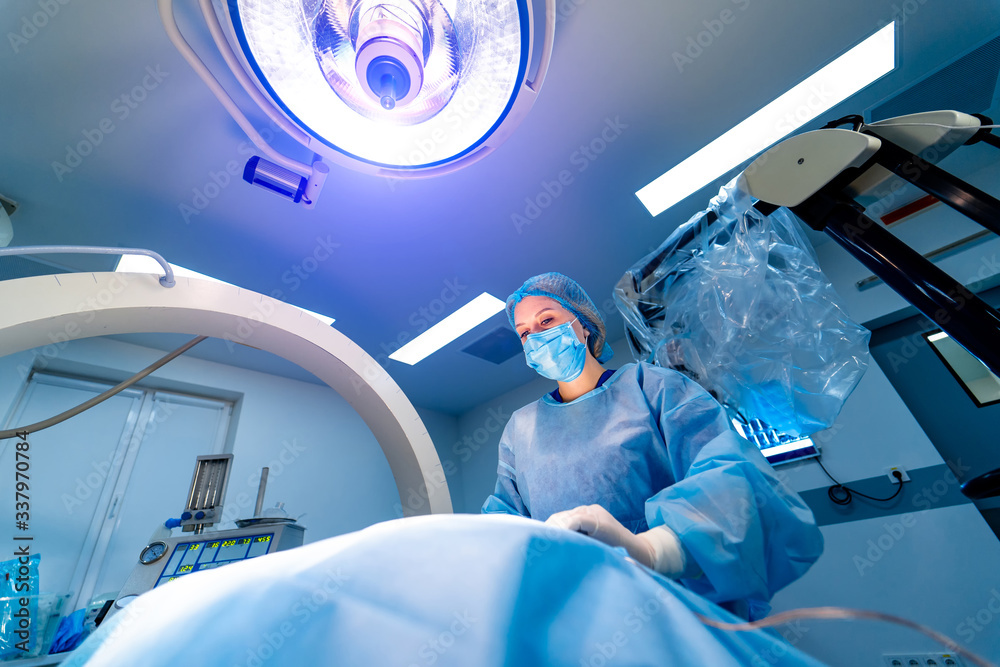 Process of surgery operation using medical equipment. Operating room ...