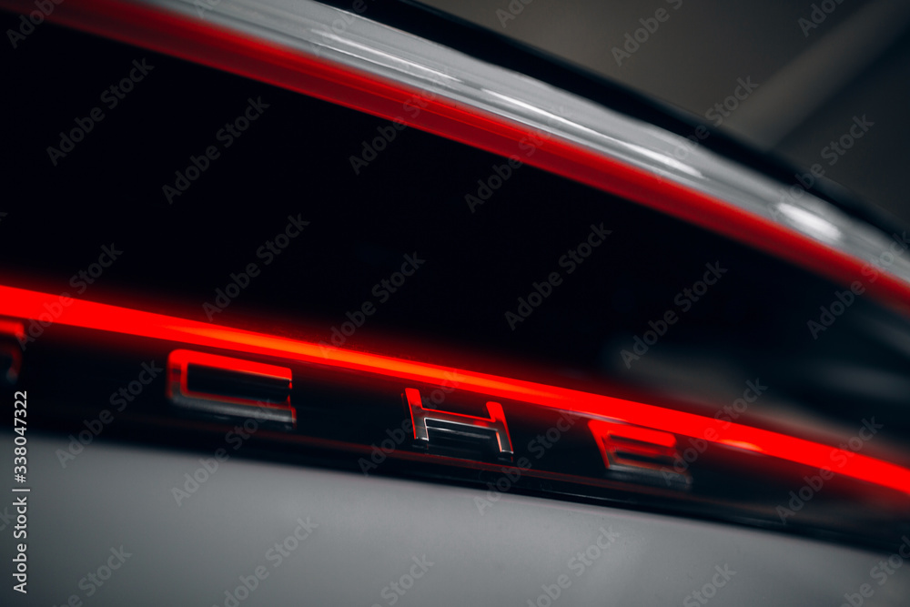 Porsche logo at the trunk with backlight Stock Photo | Adobe Stock
