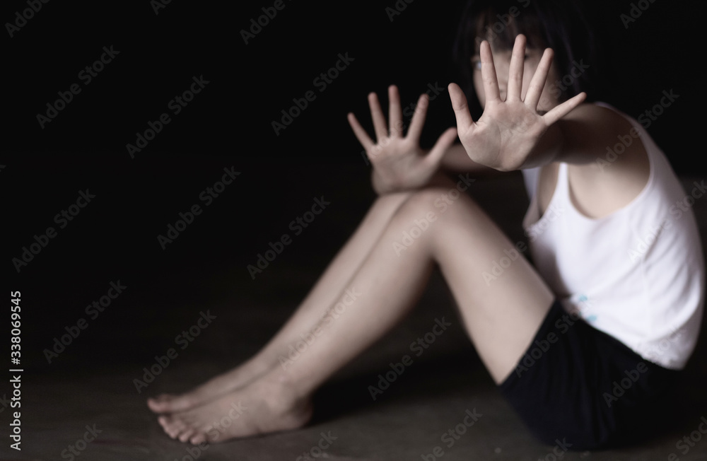 Sad little girl sitting alone on floor.traumatized children concept ...