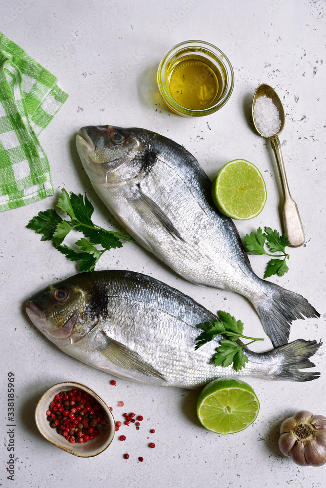 Raw dorado fish with ingredients for making. Top view with copy space ...