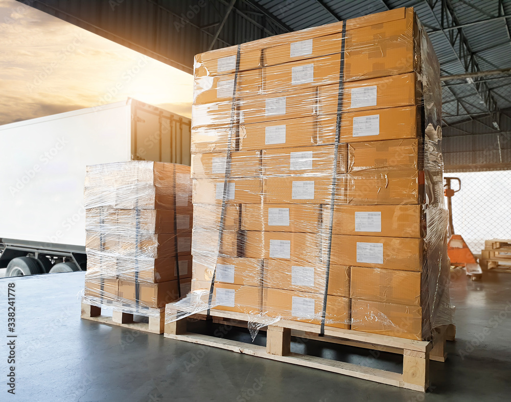 Stacked of Package Boxes Load with Cargo Container. Trailer Truck ...