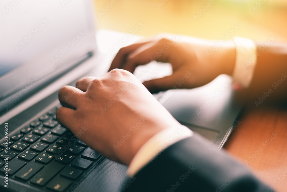 Male hand typing on keyboard concept - Businessman working on keyboard ...