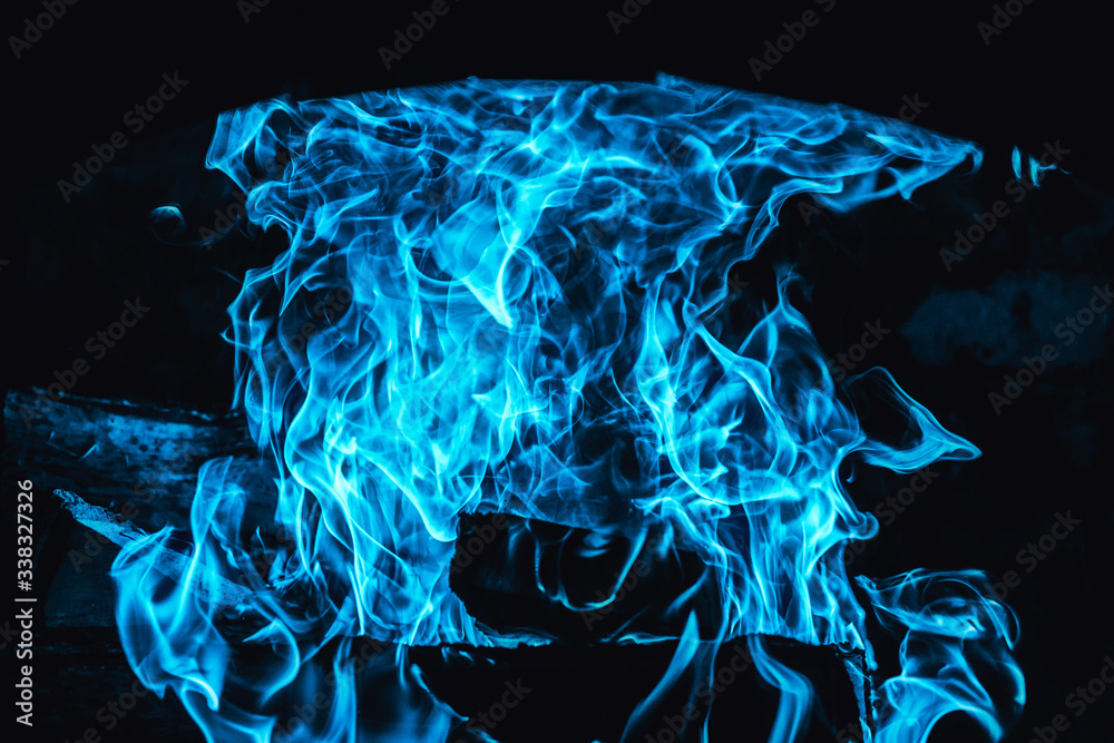 blue fire flames in fireplace. blue magic fire. Stock Photo | Adobe Stock