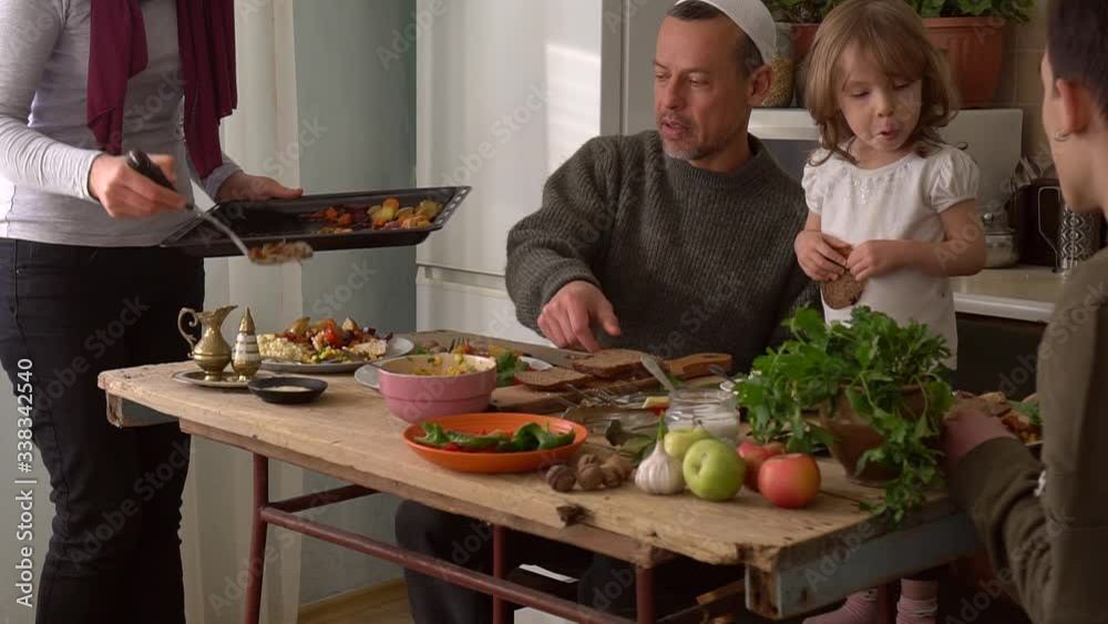 Ramadan Month. Arabic muslim family eating traditional Middle Eastern ...
