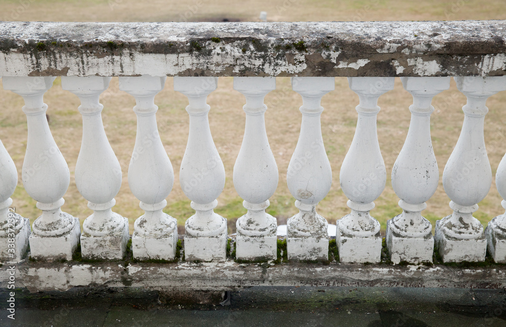 Old terrace balusters made of painted concrete Stock Photo | Adobe Stock