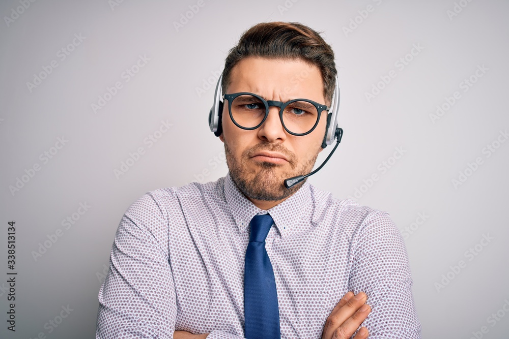 Young call center operator business man with blue eyes wearing glasses ...