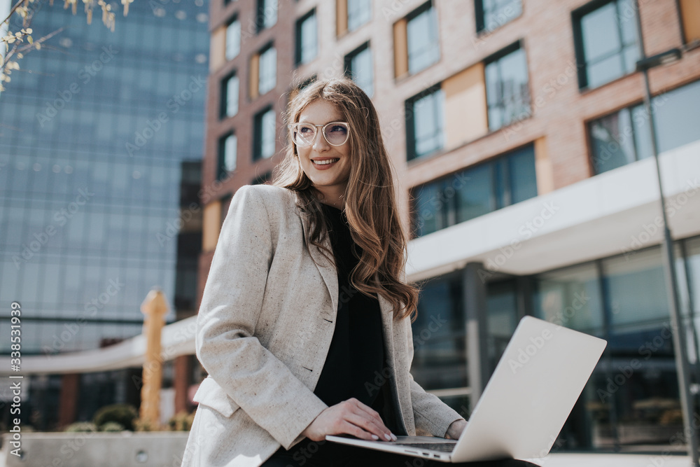 Beautiful lady with laptop working. Female influencer chat with her ...