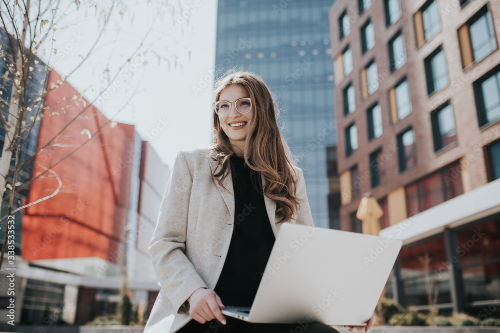 Beautiful lady with laptop working. Female influencer chat with her ...