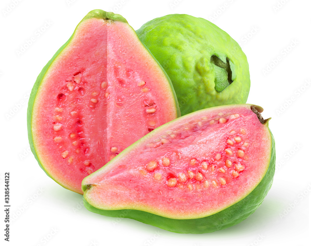 Isolated guava fruits. Pink guavas with green skin cut in halves ...