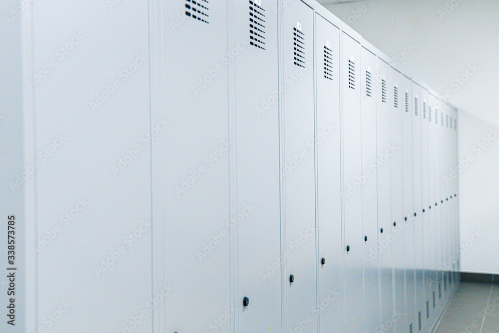 White lockers in a changing room Stock Photo | Adobe Stock