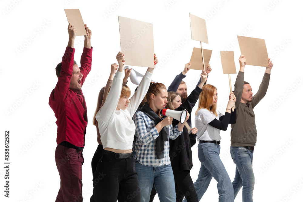 Emotional multicultural group of people screaming while holding blank ...