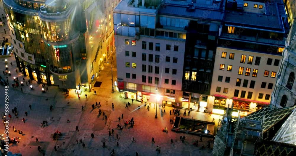 Vienna, Austria. A crowd of people at the Stephansplatz. Aerial night ...