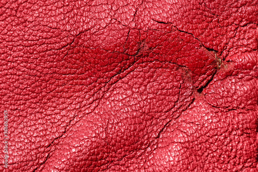 Shabby and worn red faux leather texture background with cracks and ...