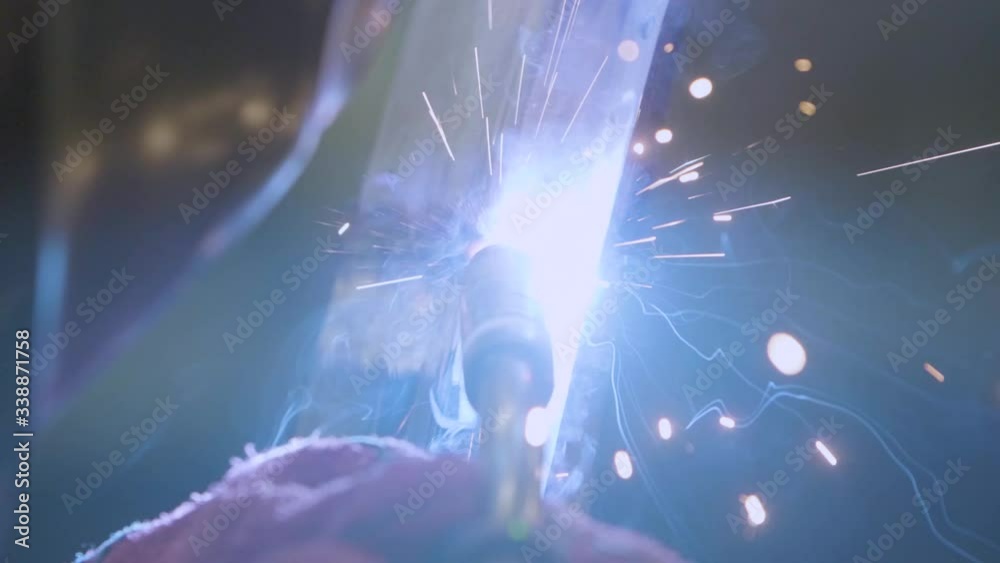 Welding sparklers particles of Car. Super slow motion Extreme Close Up ...