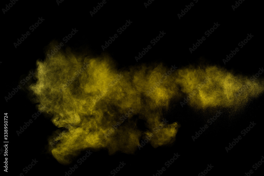 Yellow powder explosion.Yellow powder explosion on black background ...