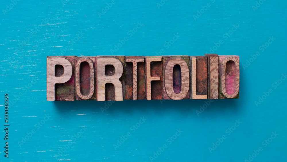 Portfolio word written with wood type blocks Stock Photo | Adobe Stock