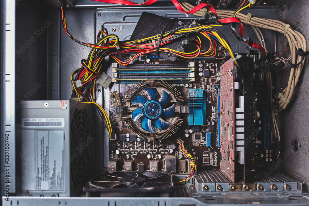 Fotografia do Stock: Dust on the cooler of a laptop computer processor with a motherboard and a ...