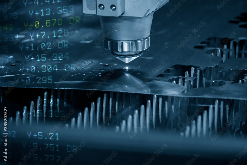 The abstract scene of fiber laser cutting machine cutting the sheet ...