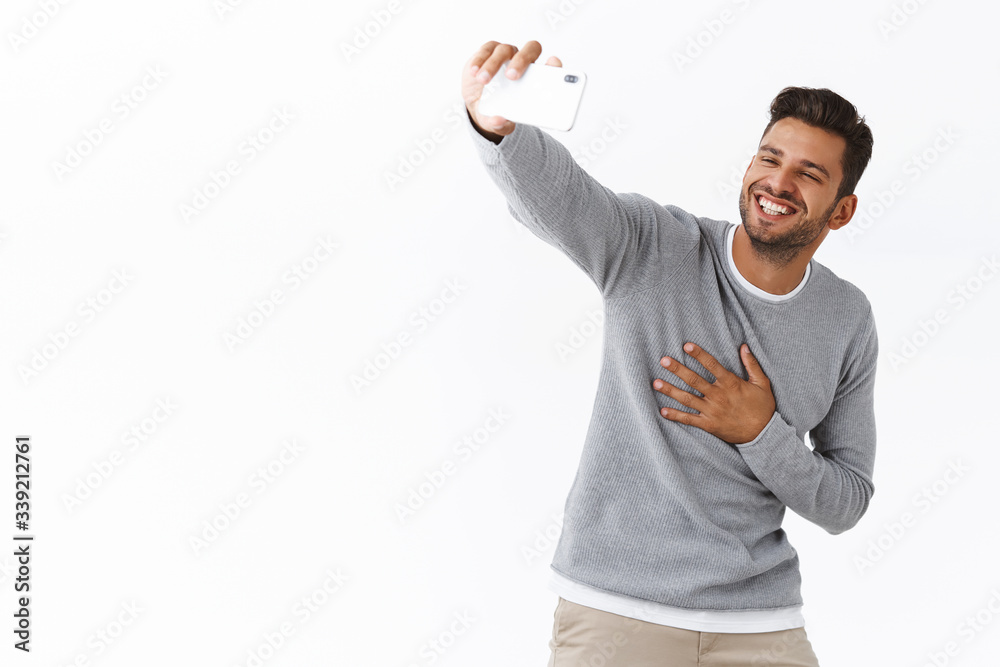 Cheerful and charismatic european guy with bristle talking to friend ...