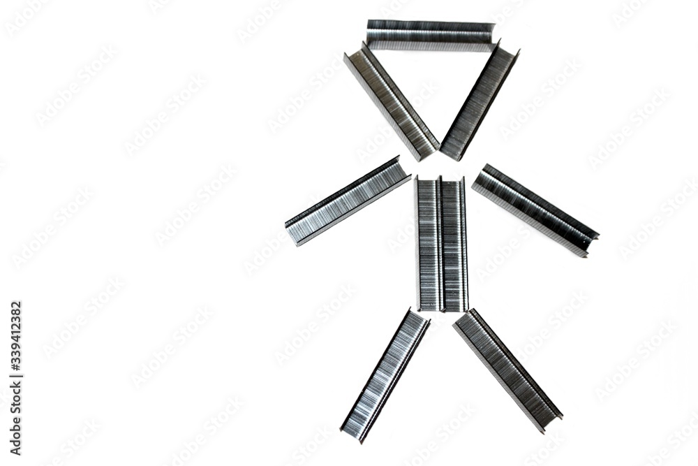 The man laid out the staples for the stapler. Figure from brackets on a ...