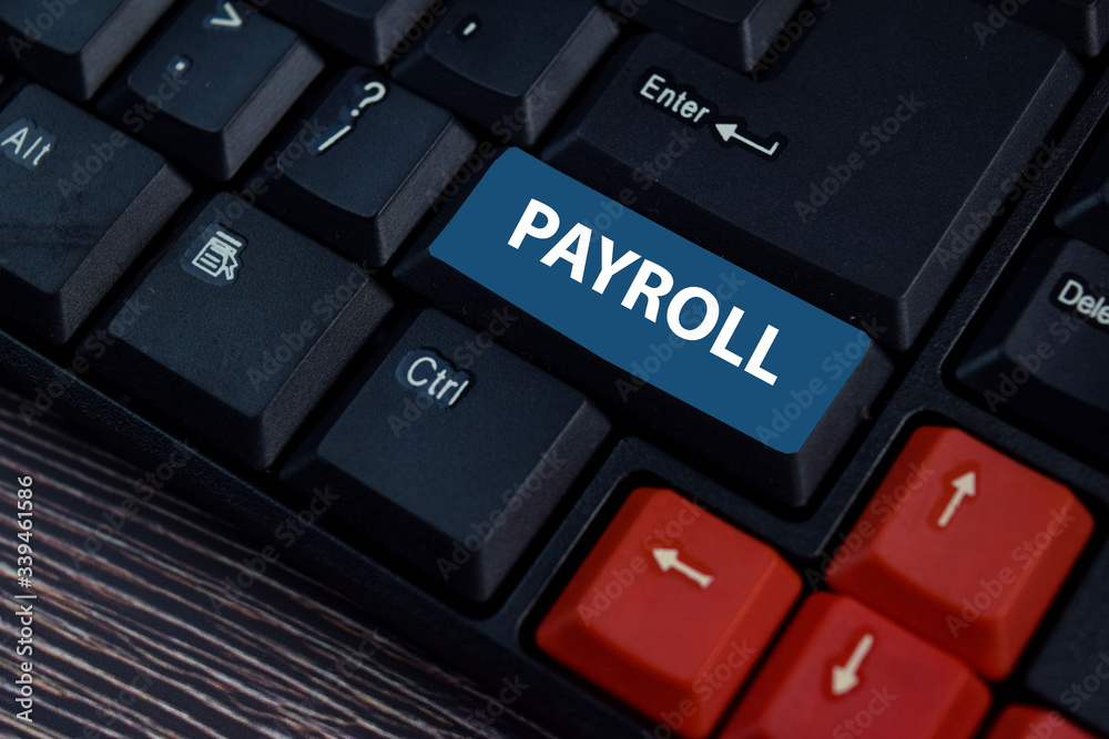 Payroll write on keyboard isolated on laptop background Stock Photo ...