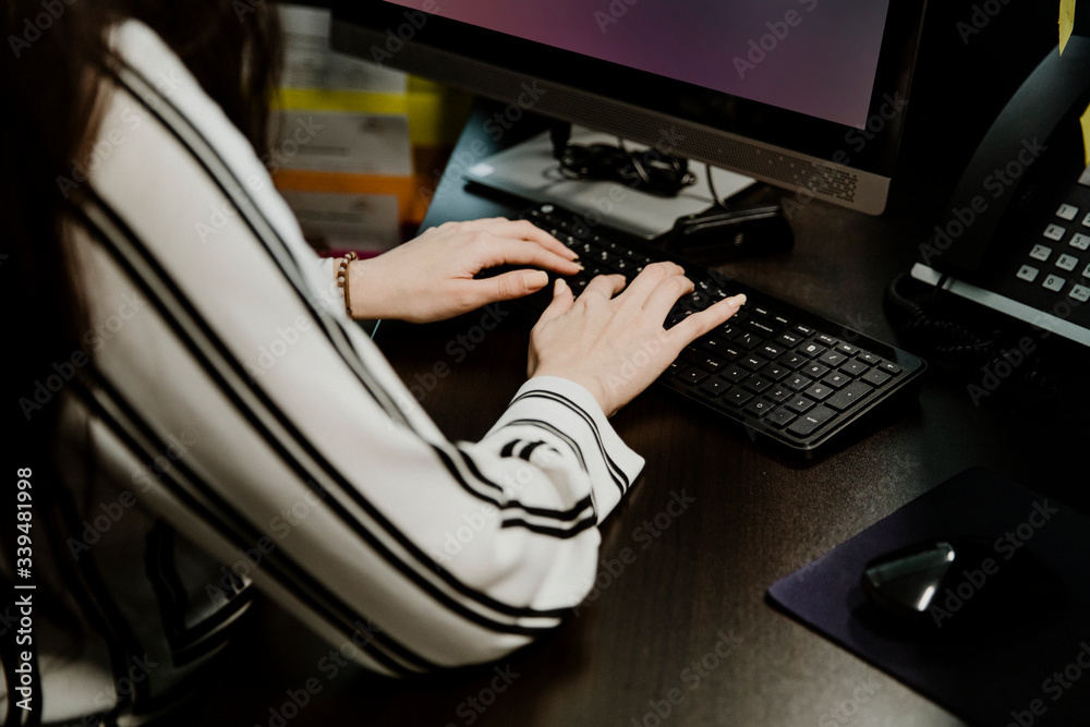 Office worker typing Stock Photo | Adobe Stock