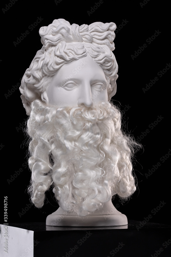 White plaster statue of a bust of Apollo Belvedere with a long white ...