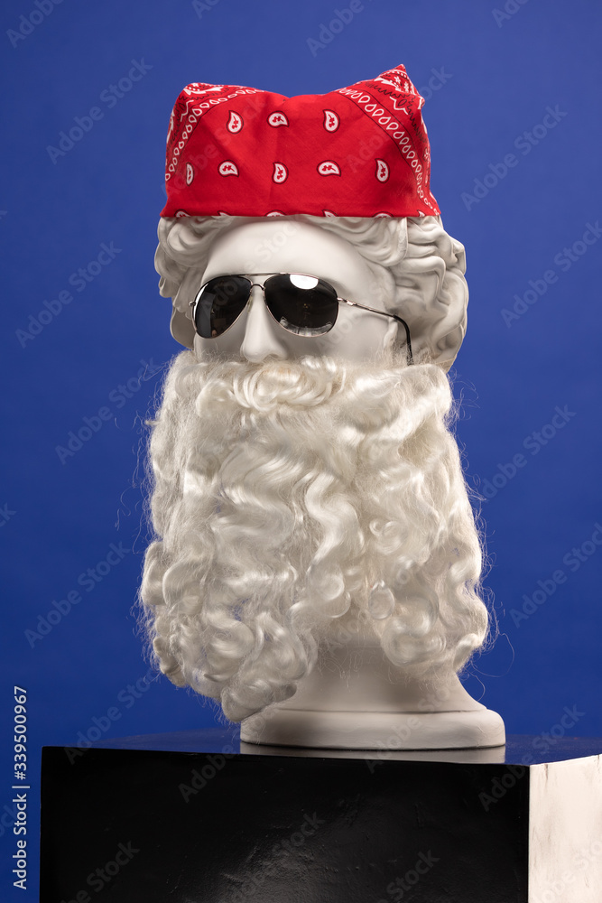 Statue of a bust of Apollo Belvedere with a long white beard in ...