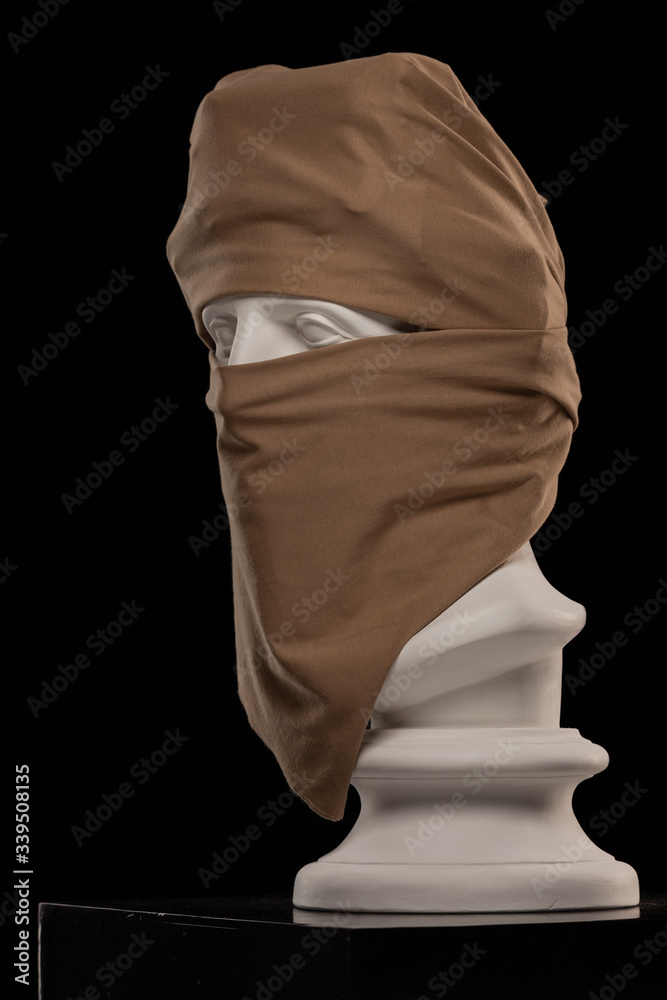 White plaster statue of a bust of Apollo Belvedere in hijab niqab Stock ...