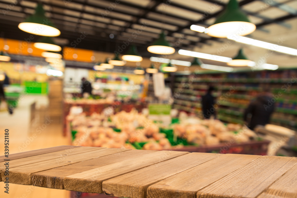Supermarket background, Counter over blur grocery background, Wooden ...