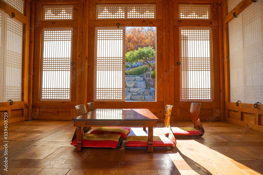 Interior with sliding doors, a small table.Traditional korean ...