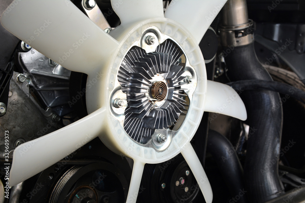 Modern system of cooling with a large fan blades from the car engine ...