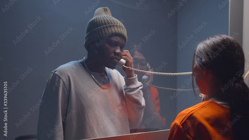 Visitor room in the prison. Man and woman are talking Stock Photo ...