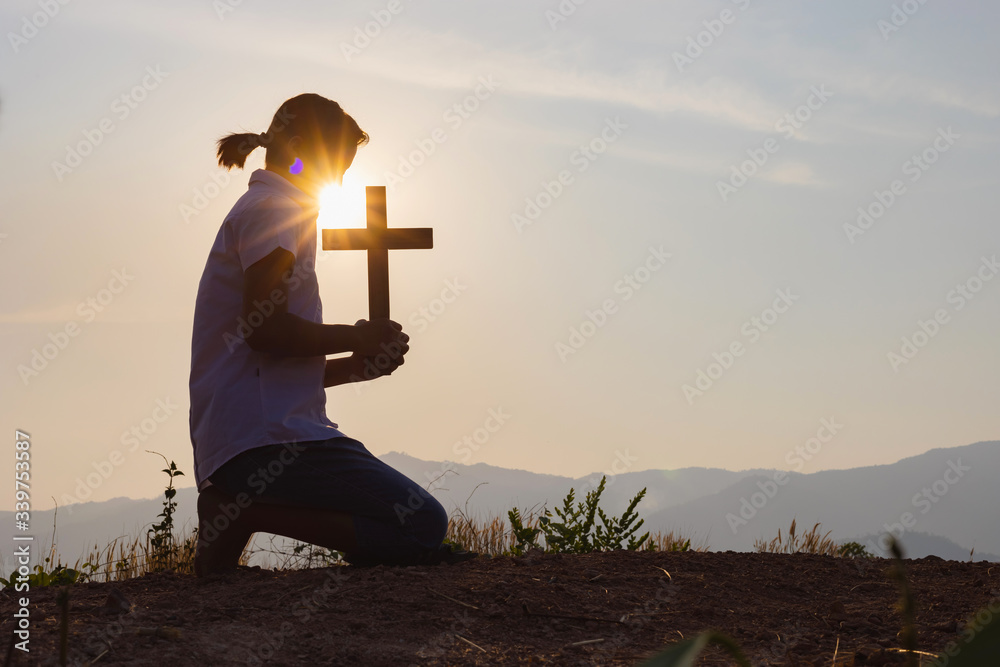 Christian, Christianity, Religion copy space background. Human kneeling ...