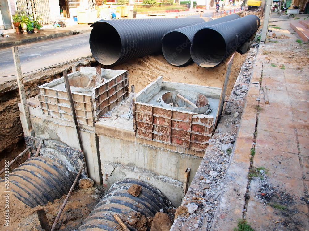 Corrugated pipe connecting the drain hole Along with plastic pipes at ...
