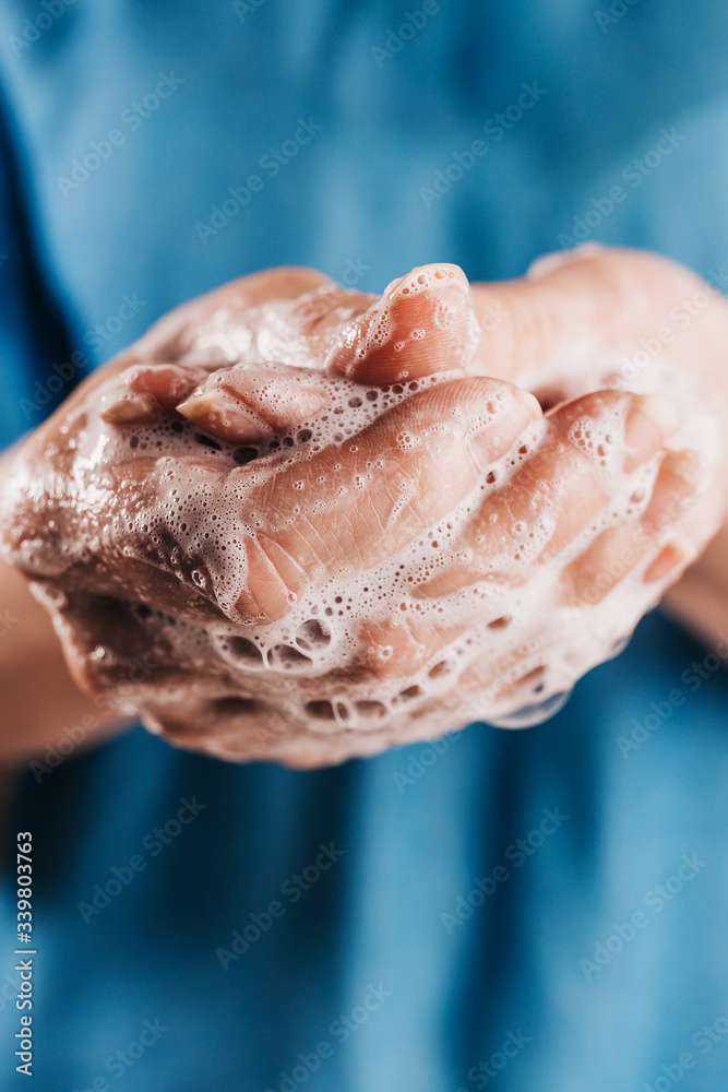 Thorough hand washing with soap - thick soapy foam on the skin ...