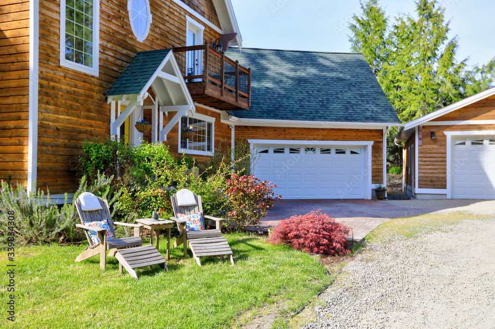 Wooden large American house with natural brown tone with white trim and ...