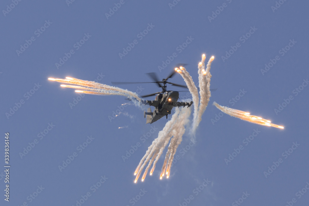 Aerobatics on a Ka-52 Hokum B helicopter with the release of heat traps ...