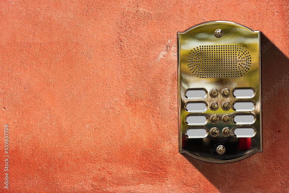 Brass intercom with eight doorbells on a red wall - Italy Stock Photo ...