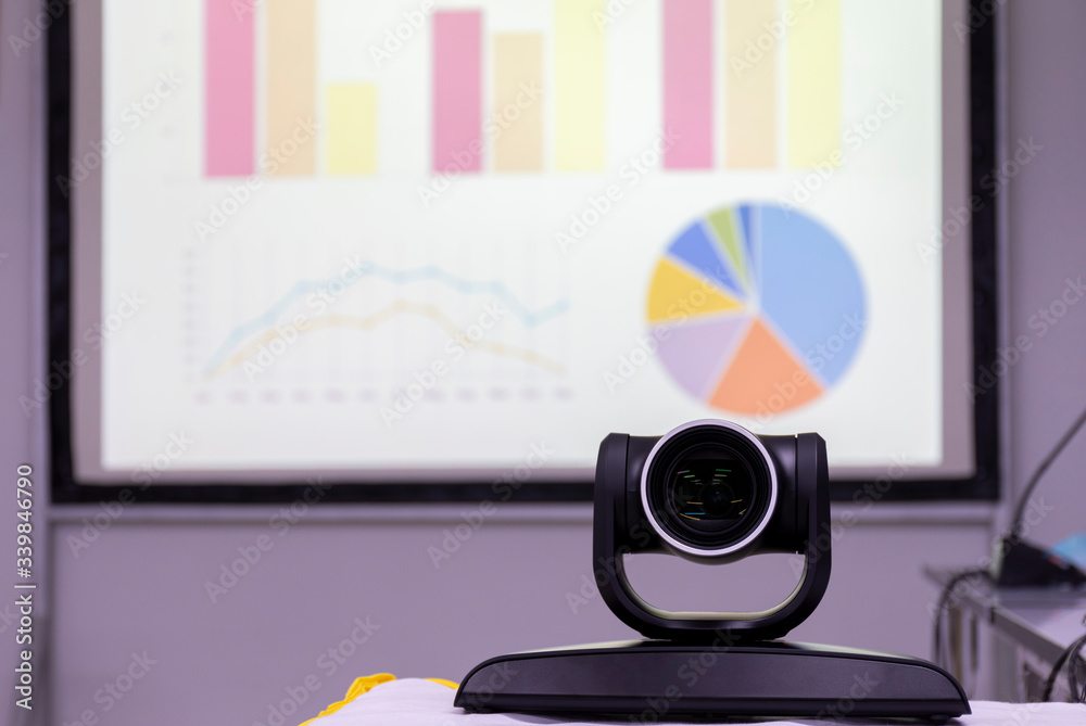Closeup Video Conference camera with Presentation meeting background ...